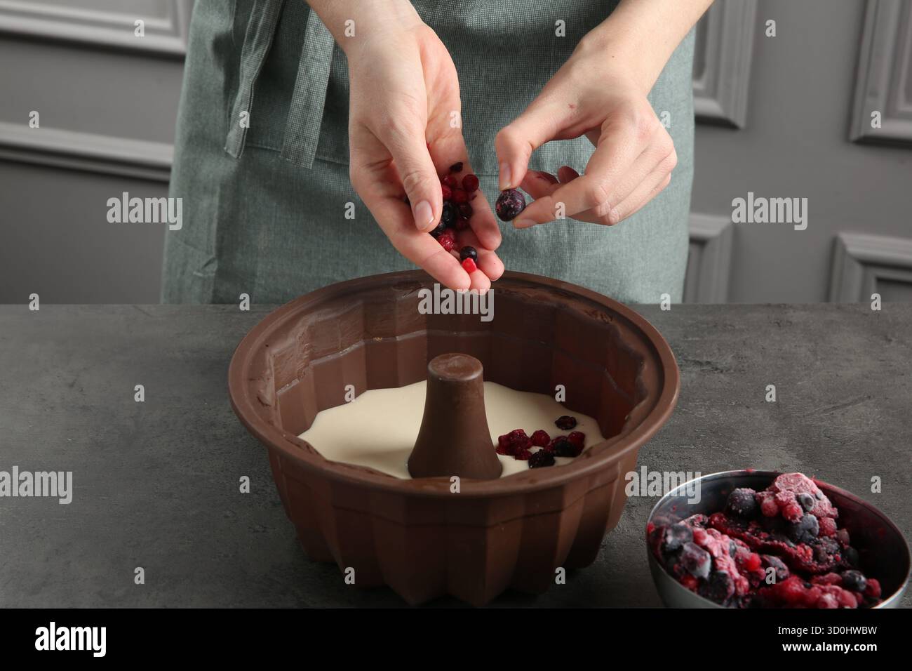 Woman putting flour liquid dough hi-res stock photography and images ...