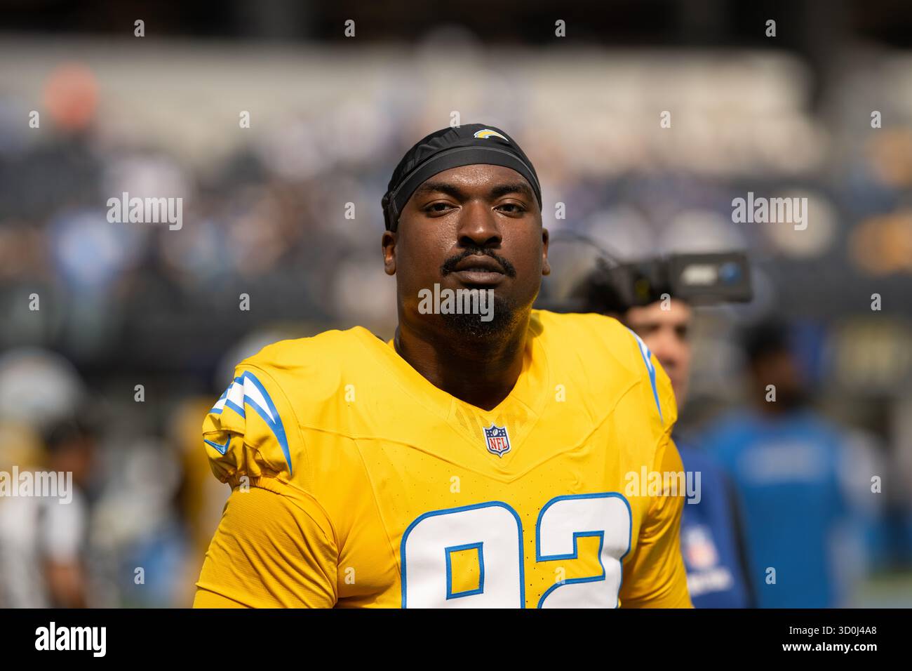 Los Angeles Chargers defensive tackle Justin Eboigbe (92) walks on the ...
