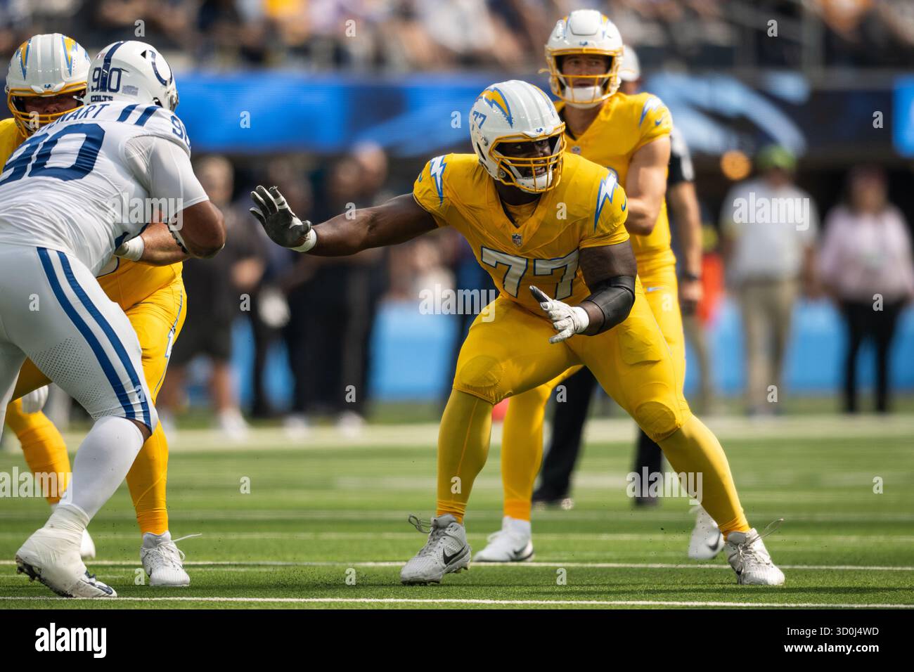 Los Angeles Chargers guard Zion Johnson (77) takes his stance during an ...