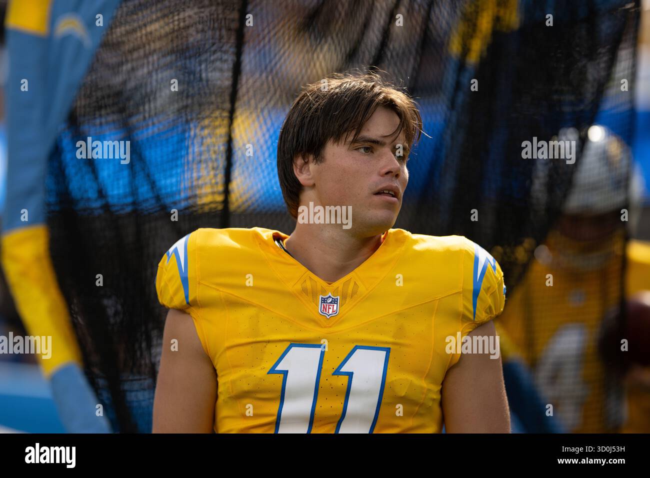 Los Angeles Chargers kicker Cameron Dicker (11) walks on the field ...