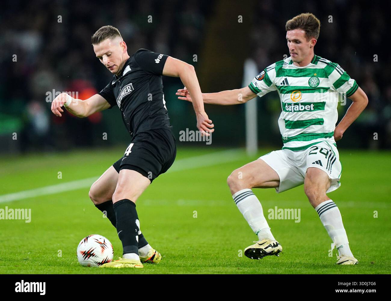 Sturm Graz's Dimitri Lavelee (left) and Celtic's Johnny Kenny battle ...