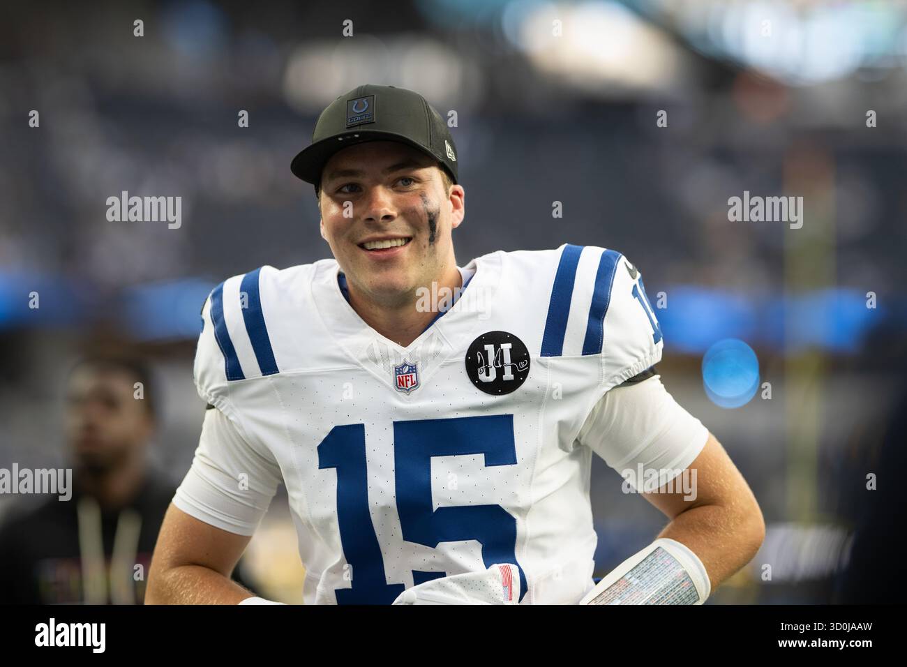 Indianapolis Colts quarterback Riley Leonard (15) jogs back to the ...
