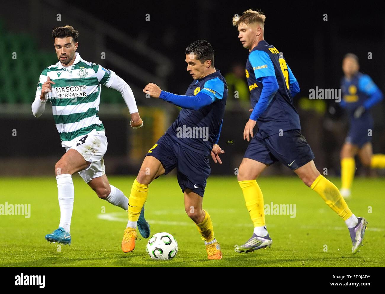 Shamrock Rovers' Danny Mandroiu (left) and Celje's Juanjo Nieto battle ...