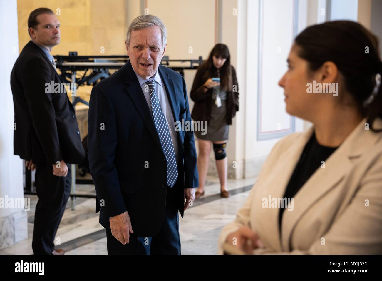Sen. Dick Durbin (D-Ill.) declines questions from reporters as he ...