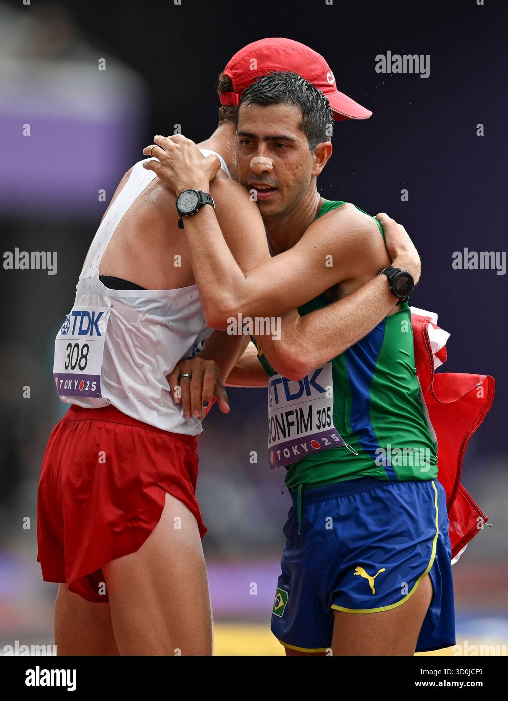 Evan Dunfee of Canada and Caio Bonfim of Brazil celebrate after ...