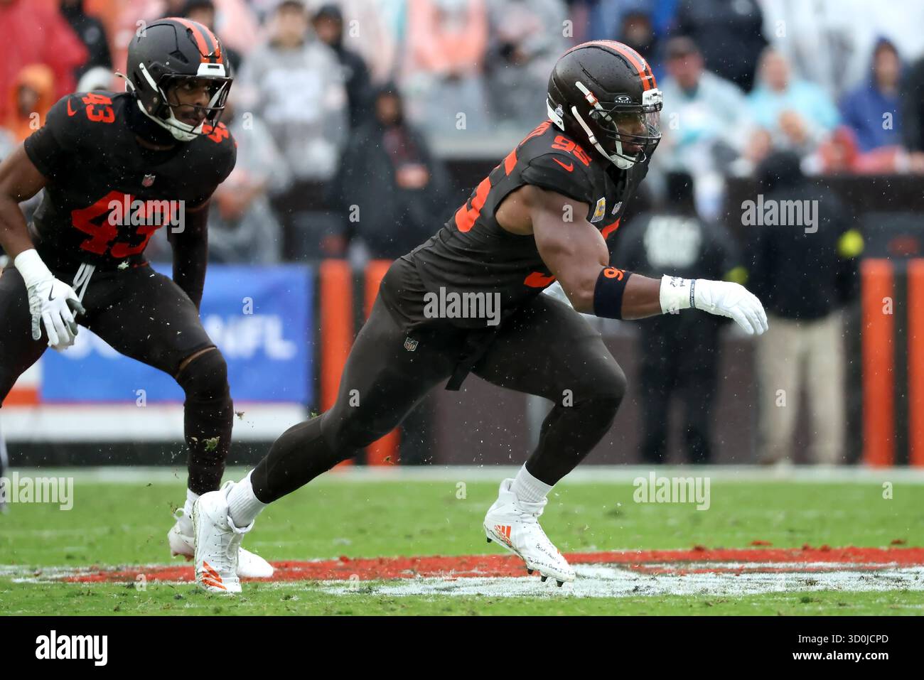 Cleveland Browns defensive end Myles Garrett (95) runs off of the line ...