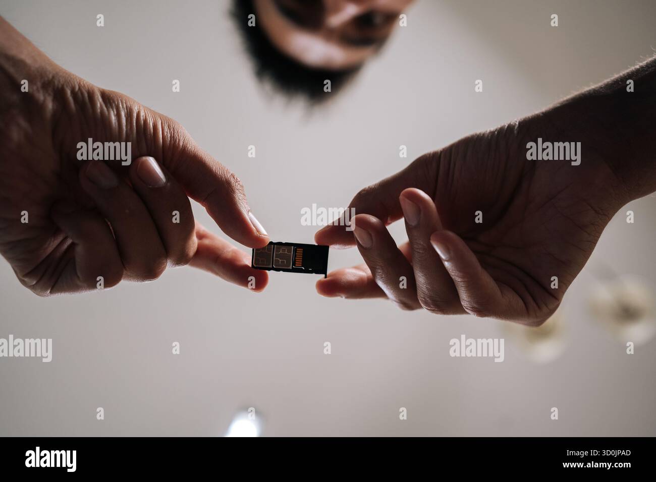 Man inserting 5g sim card hi-res stock photography and images - Alamy