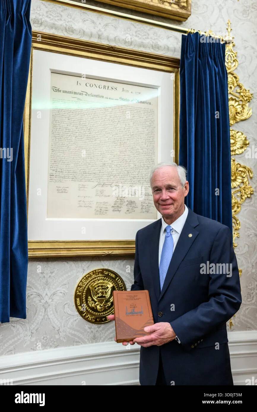 Senator Ron Johnson stands beside the Declaration of Independence ...
