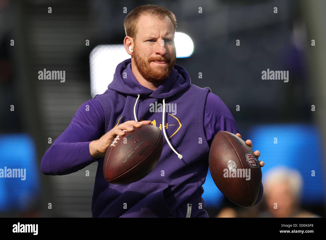 Minnesota Vikings quarterback Carson Wentz (11) warms up before an NFL ...