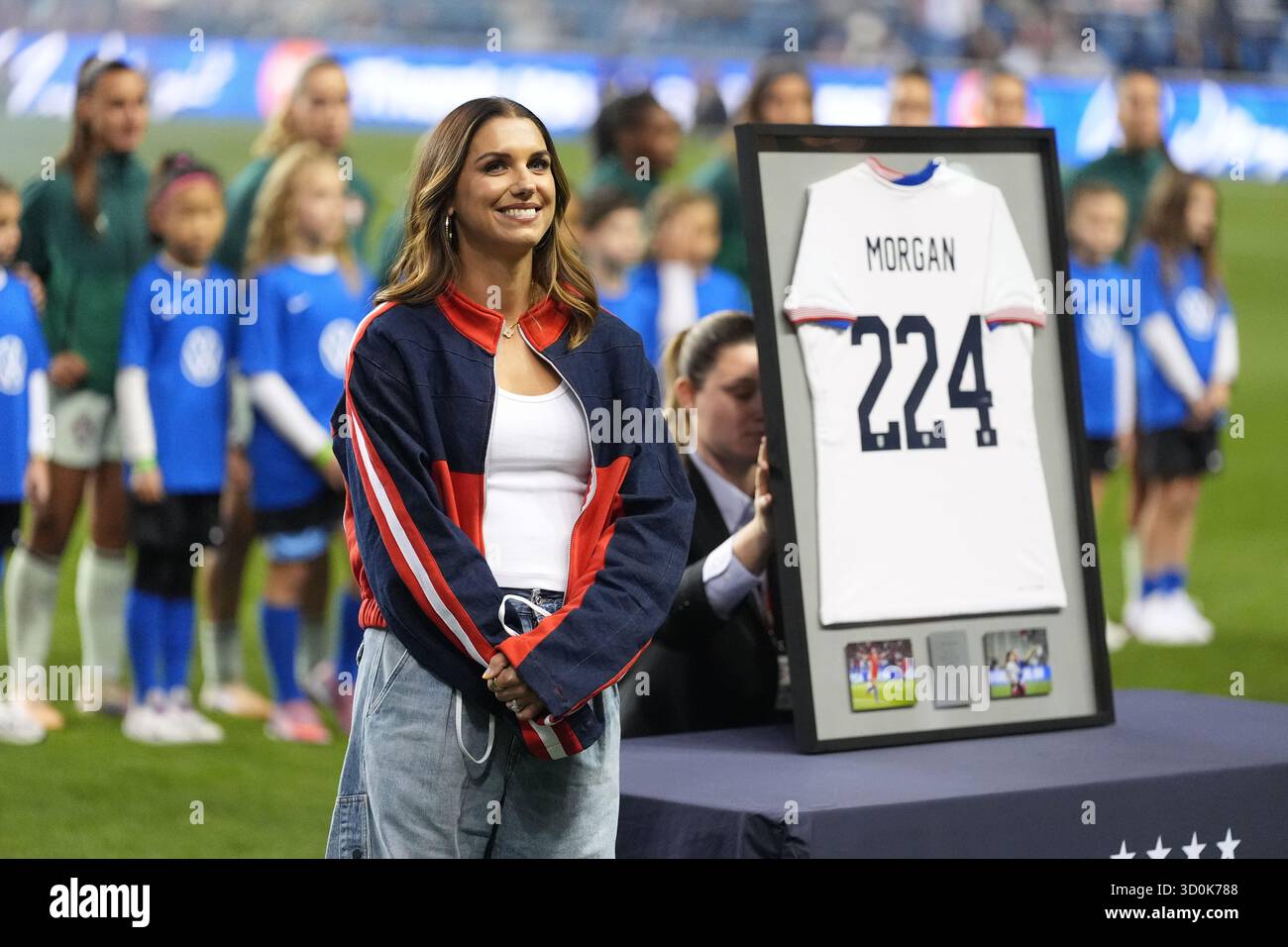 United States' Alex Morgan stands during her retirement ceremony before ...