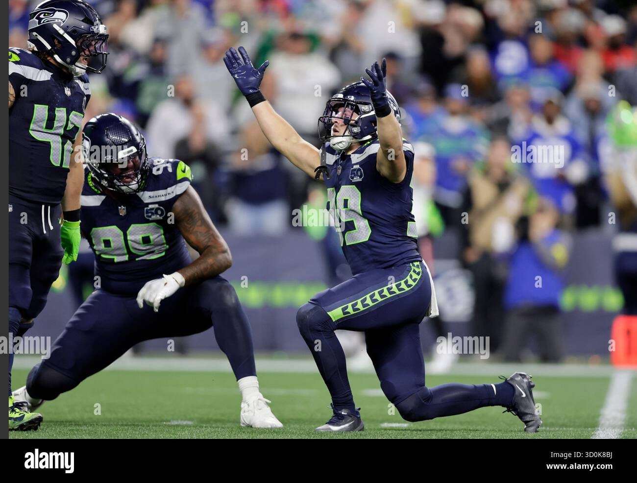 Seattle Seahawks safety Ty Okada (39), defensive end Leonard Williams ...