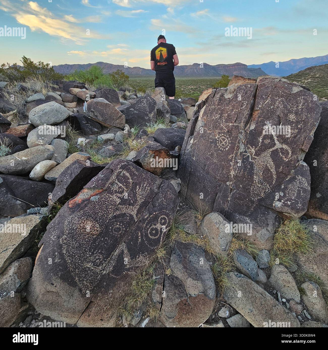 Man Flying Drone among Ancient Petroglyphs at Three Rivers Petroglyphs ...
