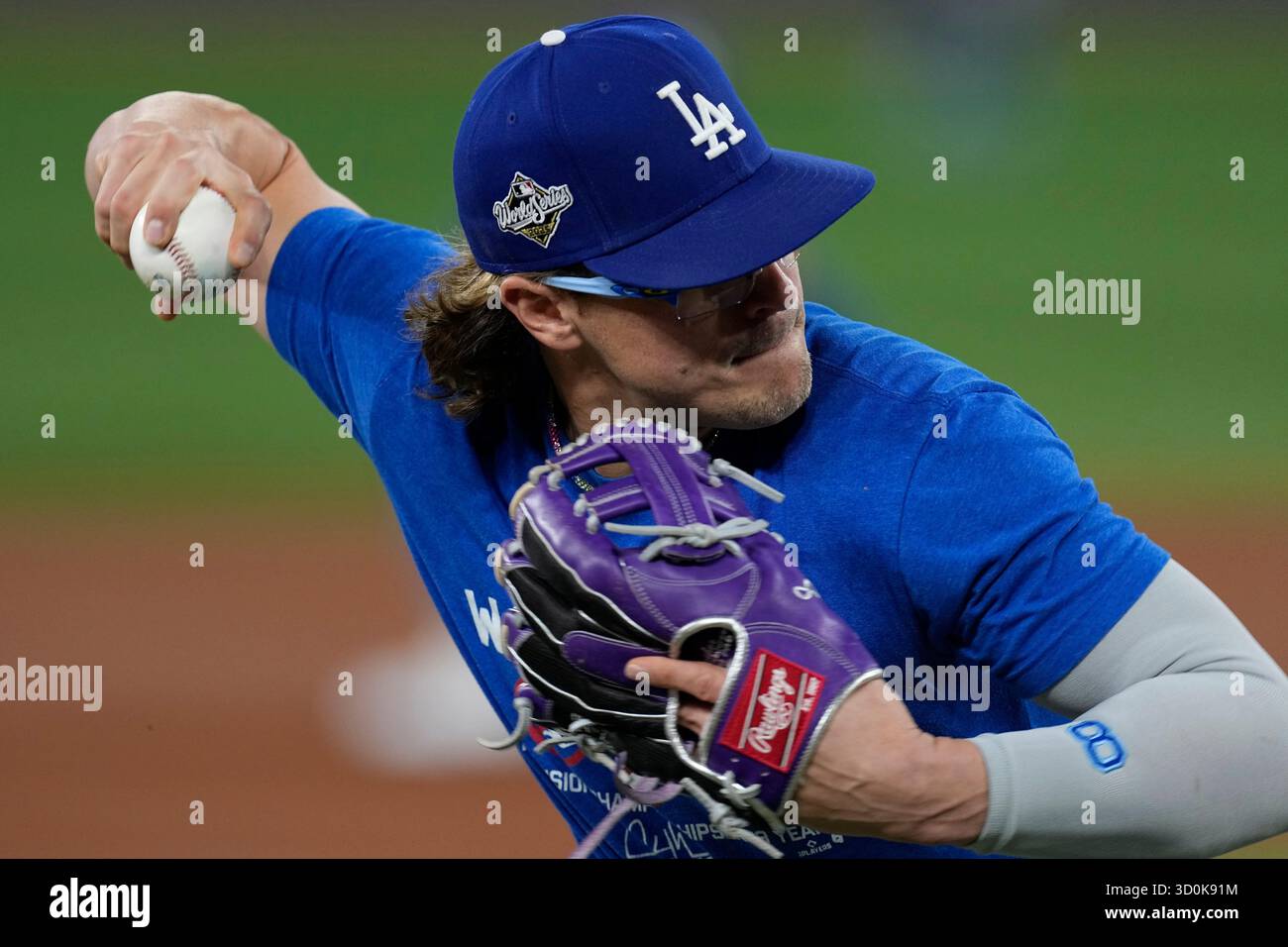 Los Angeles Dodgers' Kiké Hernández throws during a World Series baseball media day, Thursday ...