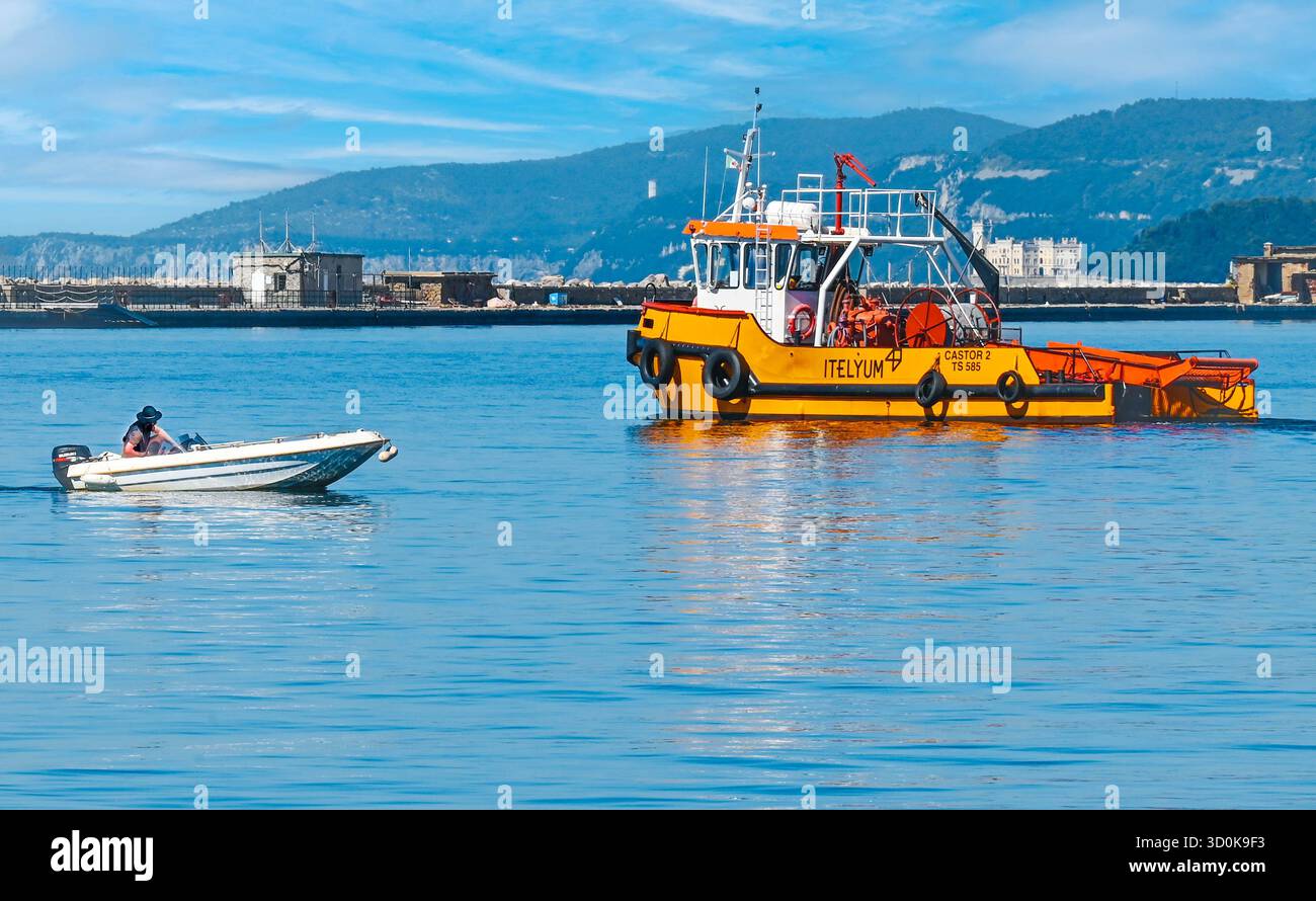 Tug boat crusies near the deep water port of Trieste, Italy on the ...
