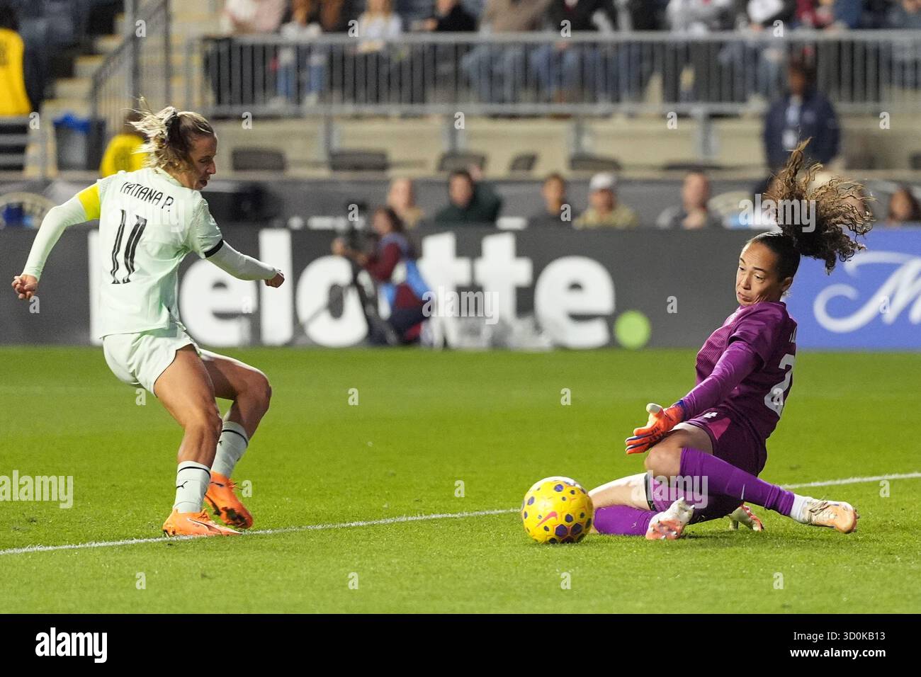 United States' goalkeeper Phallon Tullis-Joyce (24) blocks a shot by ...