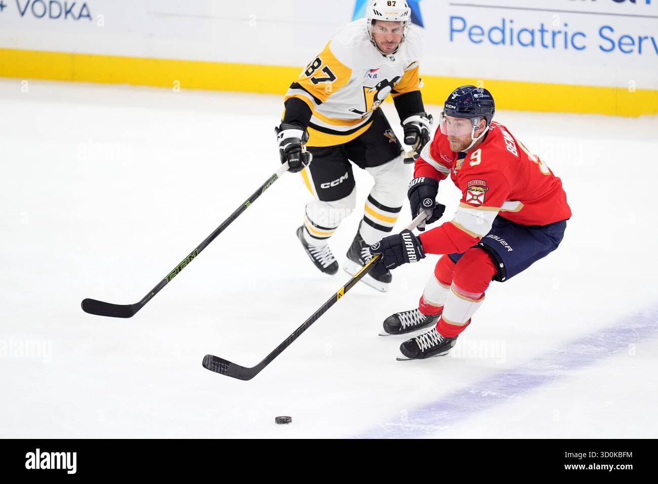 Florida Panthers center Sam Bennett (9) controls the puck under ...