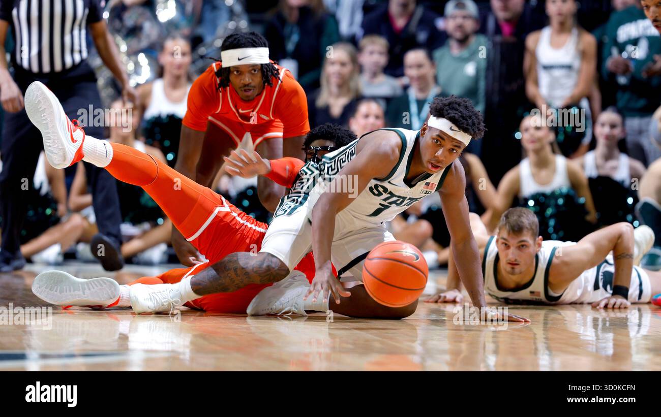 Michigan State guard Jeremy Fears Jr. (1), center, and center Carson ...