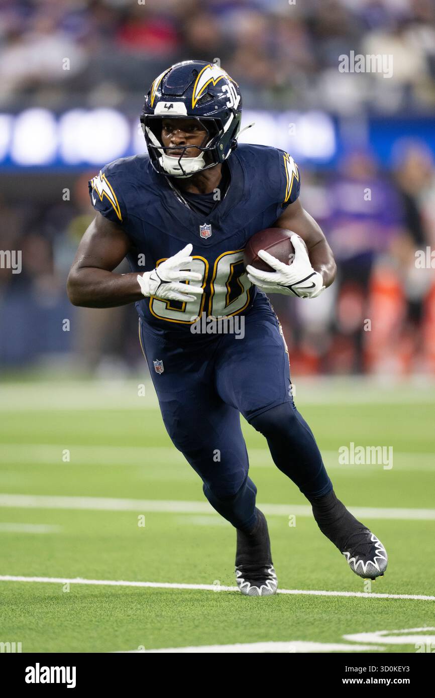 Los Angeles Chargers running back Kimani Vidal (30) runs with the ball ...