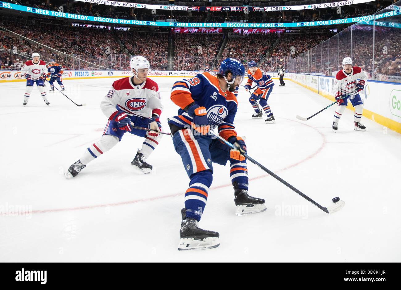 Montreal Canadiens' Juraj Slafkovsky (left) chases Edmonton Oilers ...