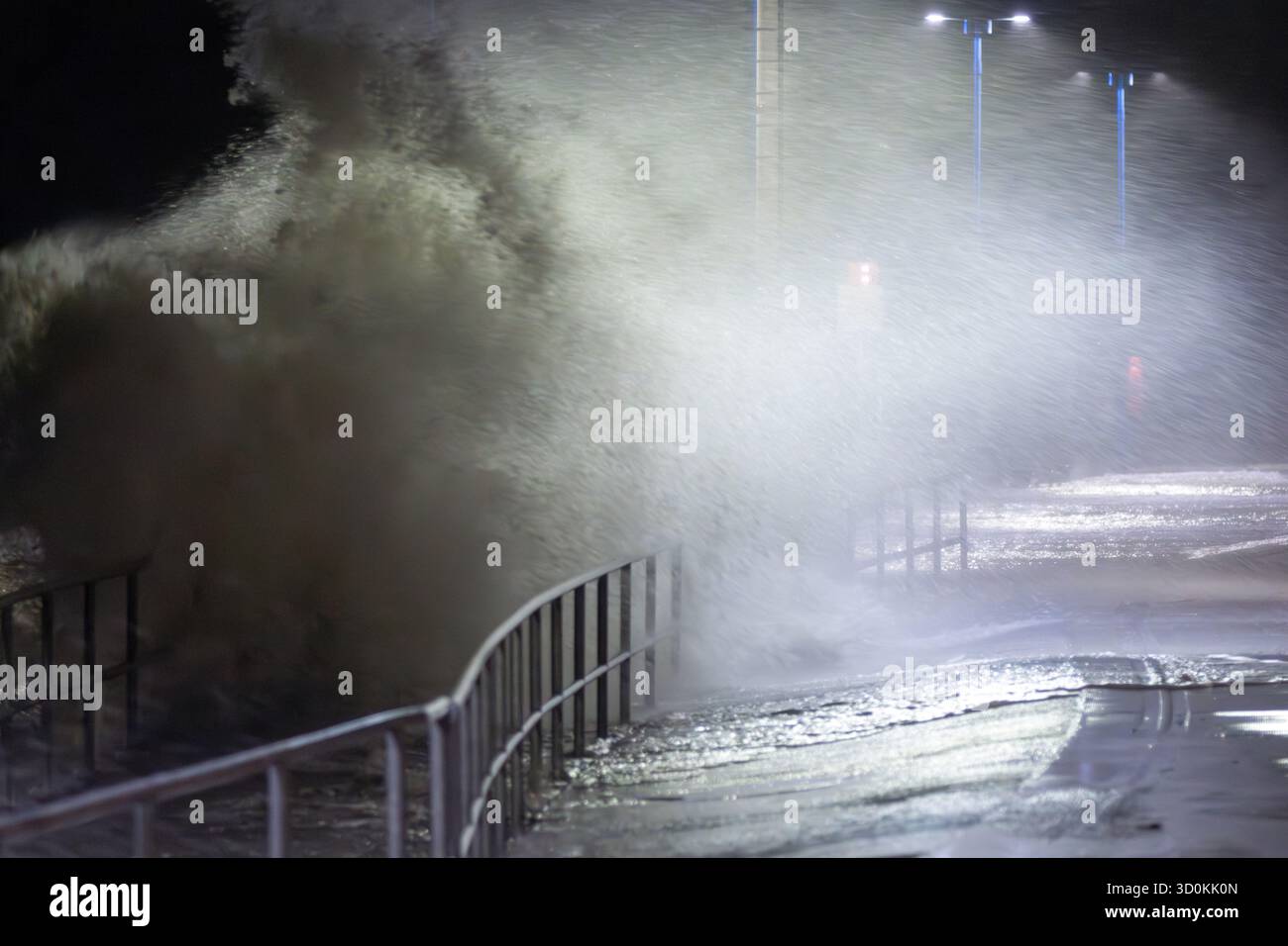 Water from the North Sea crashes against the ferry port of Dagebüll ...