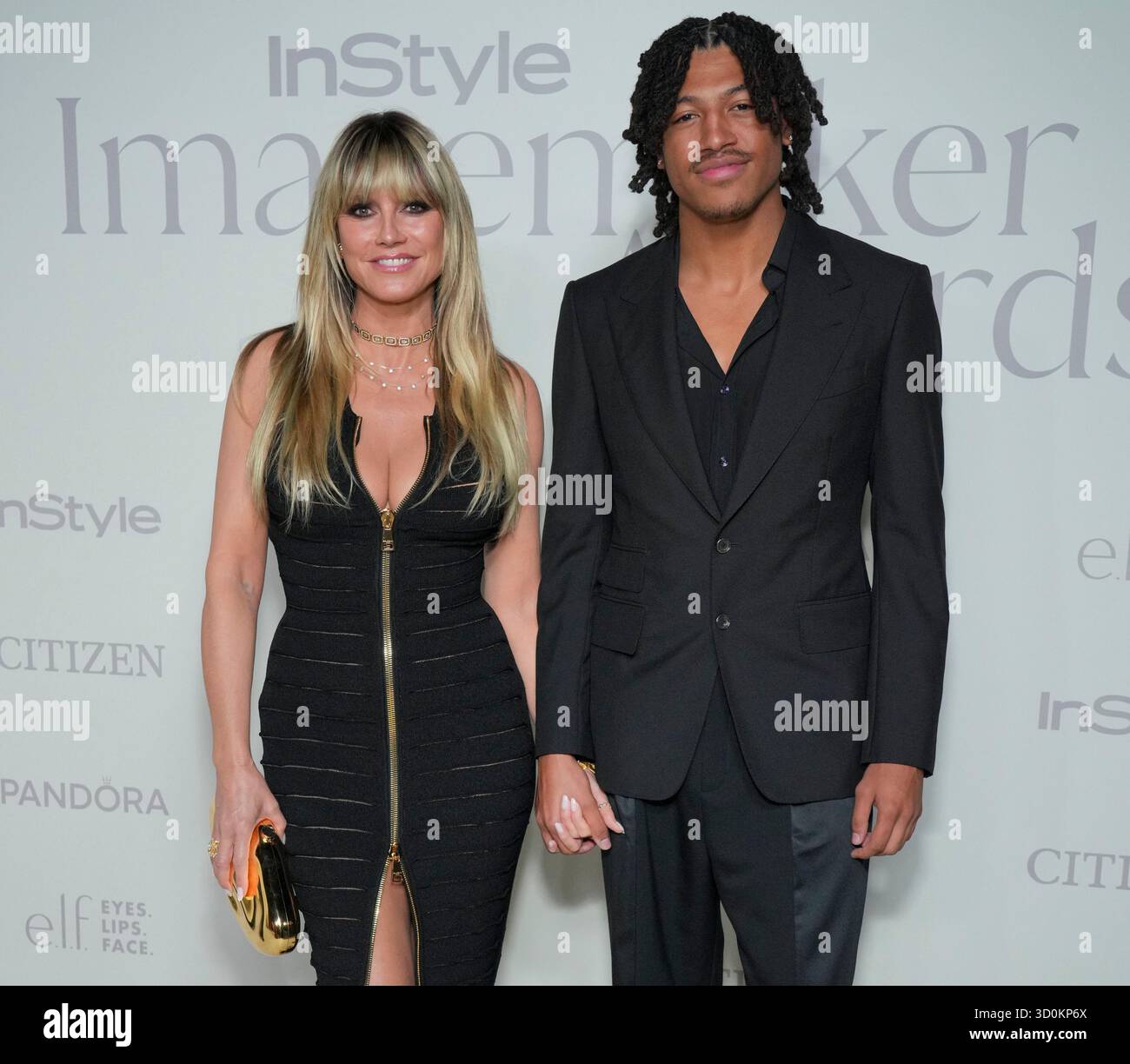 Heidi Klum, left, and Henry Samuel arrive at the InStyle Imagemaker ...