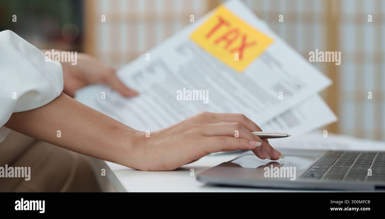 Tax management individual using hi-res stock photography and images - Alamy