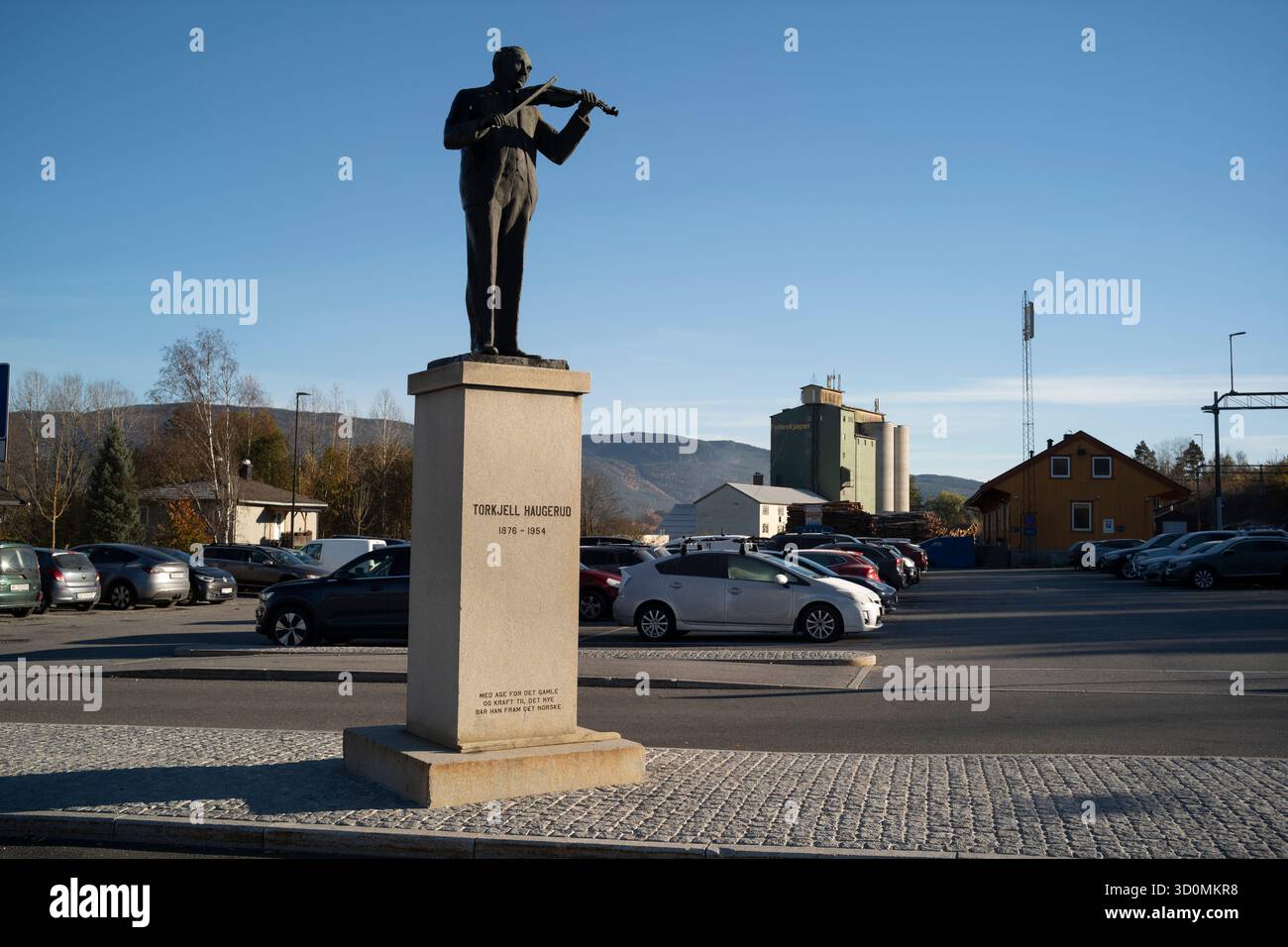 Statue of Torkjell Haugerud outside the main station of Bø, fiddler and ...