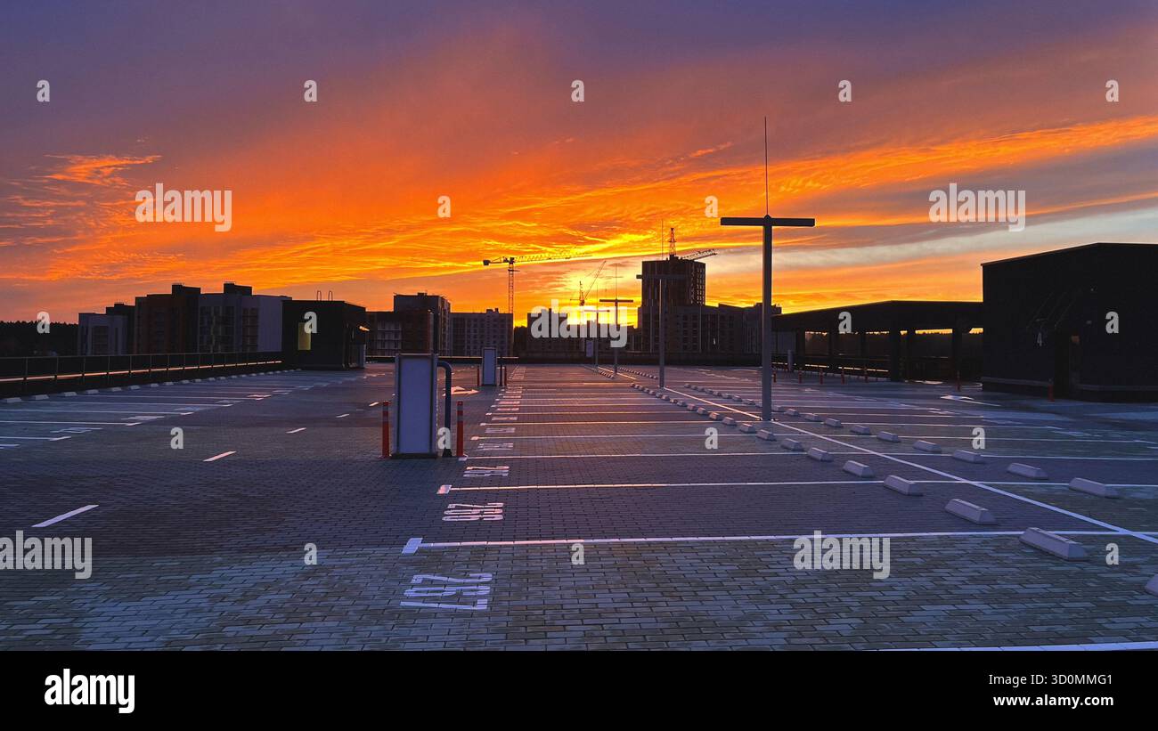 Stunning sunset, seen from a parking lot rooftop Stock Photo - Alamy