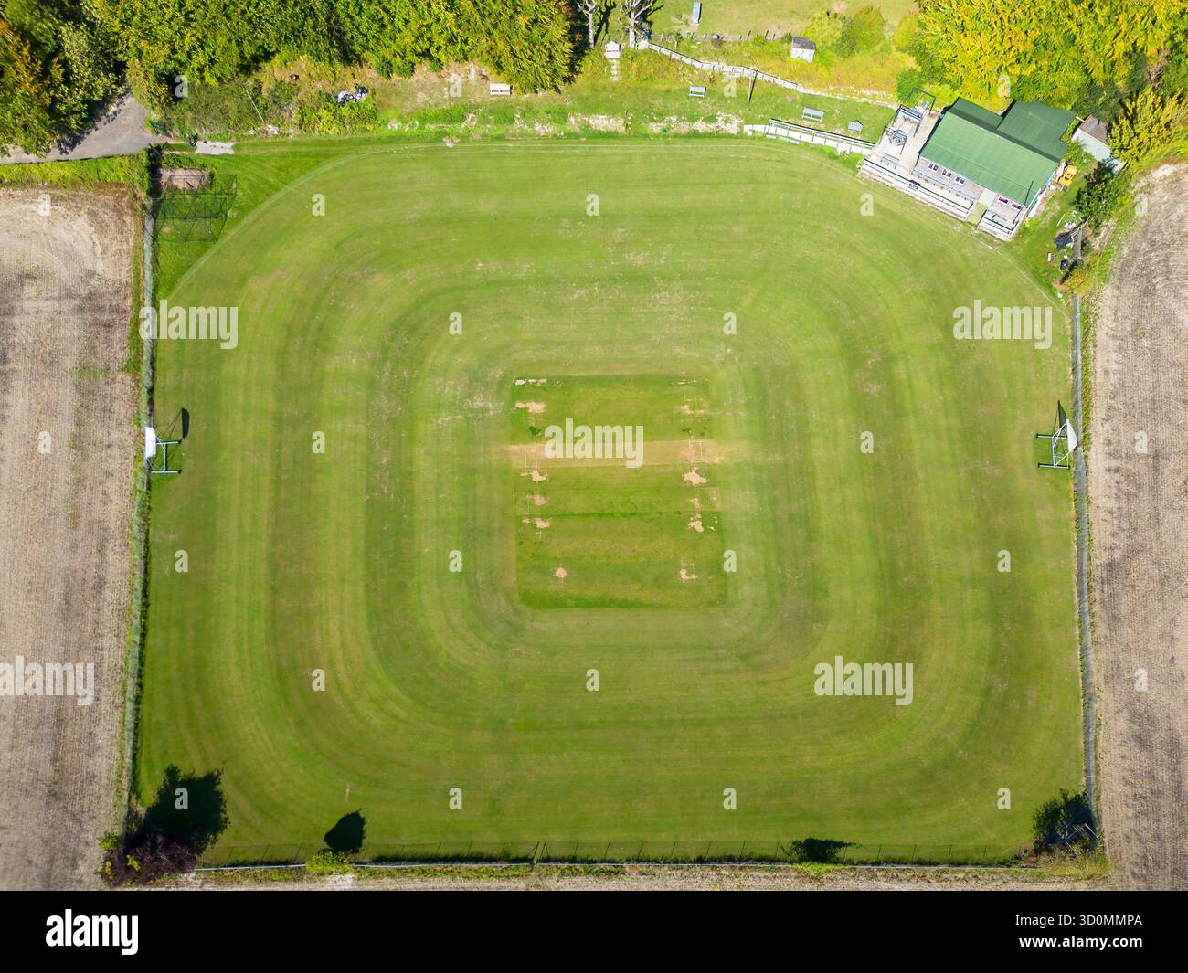 aerial view of hollingbourne cricket ground surrounded by agricultural ...