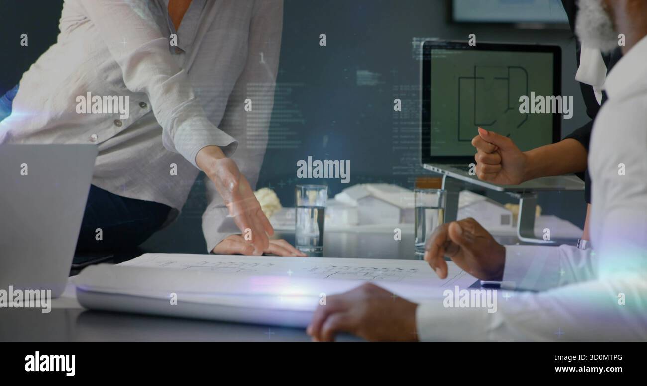 Leaning female architect in gray shirt examining blueprint in office ...