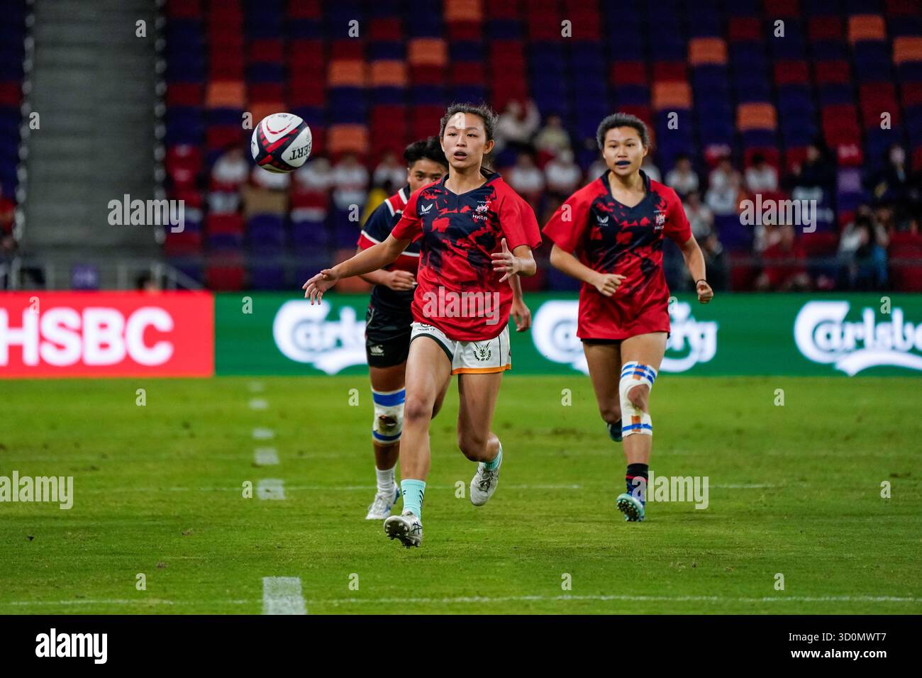 Rugby players from the girls dragon and dragon select team playing on ...