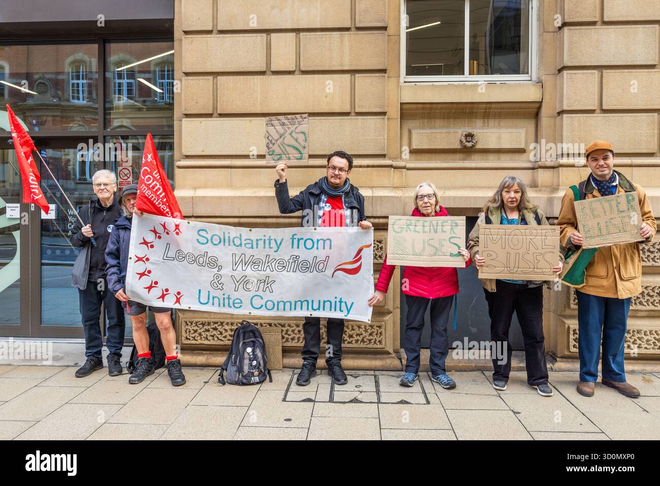 Leeds, UK. 24 OCT, 2025. Better Buses campaigners gather for a short ...