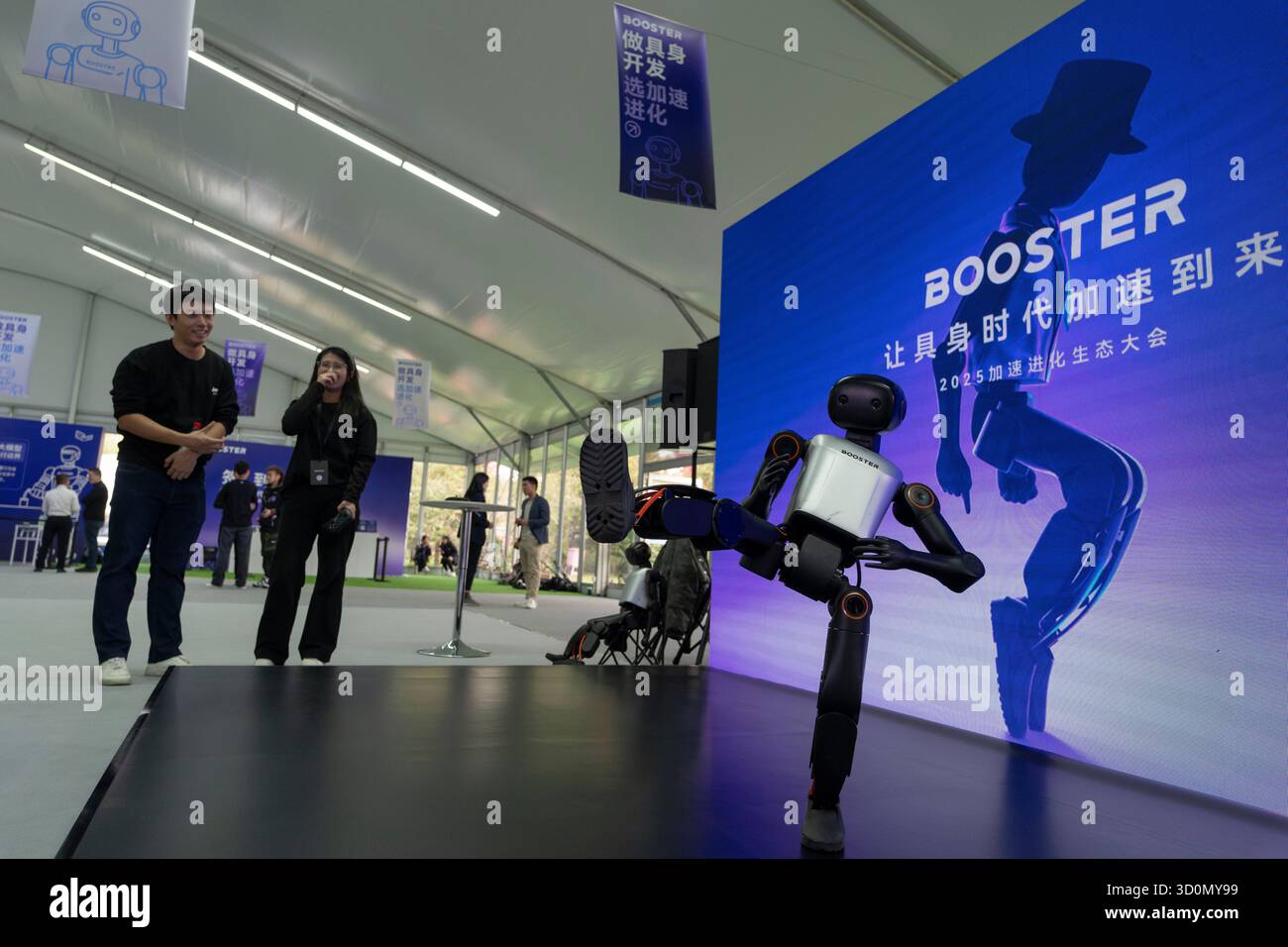 The newly launched K1 robot from Booster Robotics demonstrates Michael ...