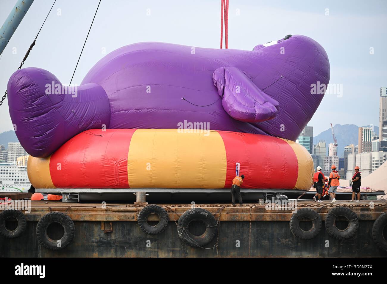 A large inflatable Grimace Sculpture setting at Hong Kong Victoria ...