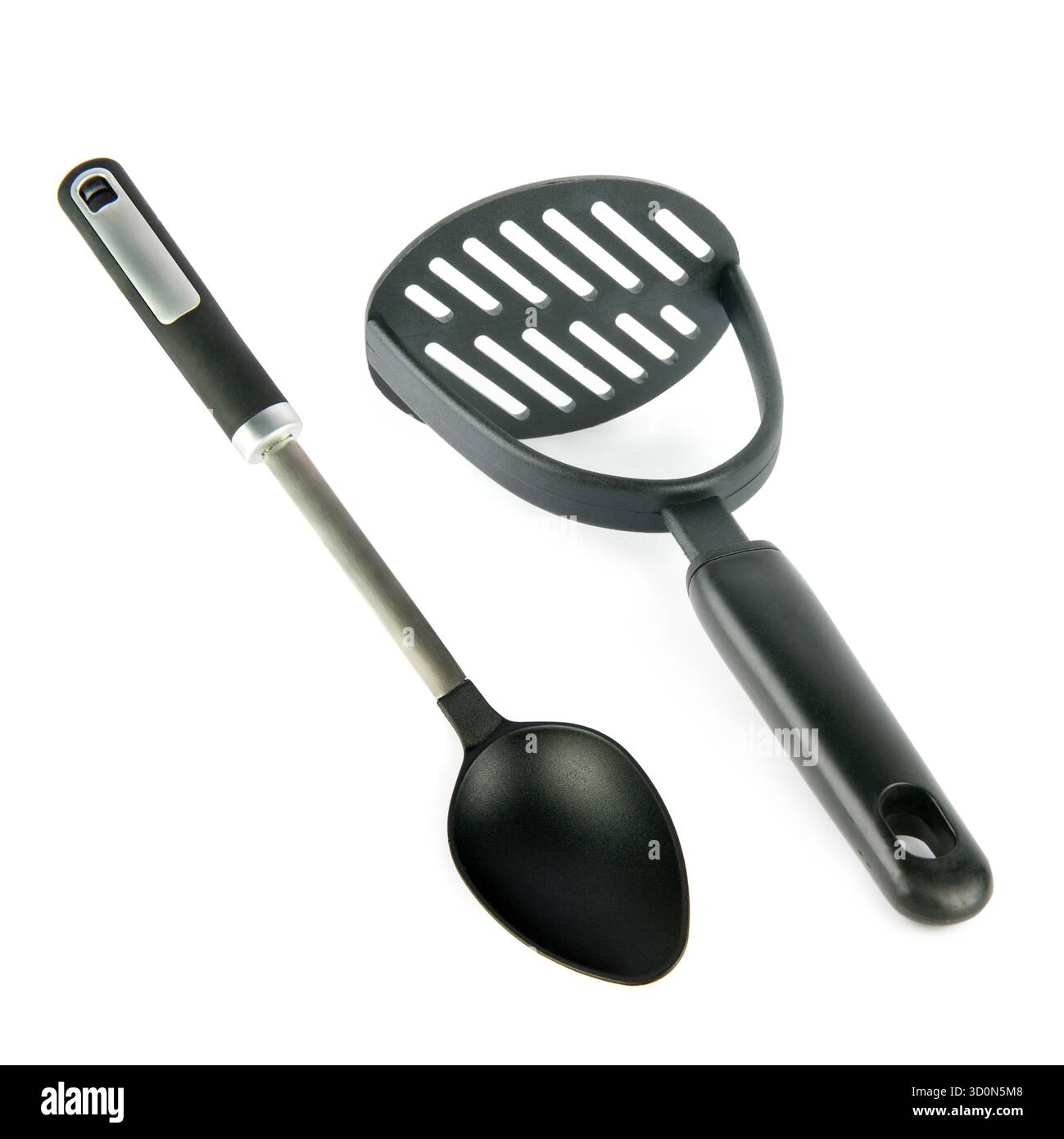 A practical black and silver cooking spoon is paired with a potato ...