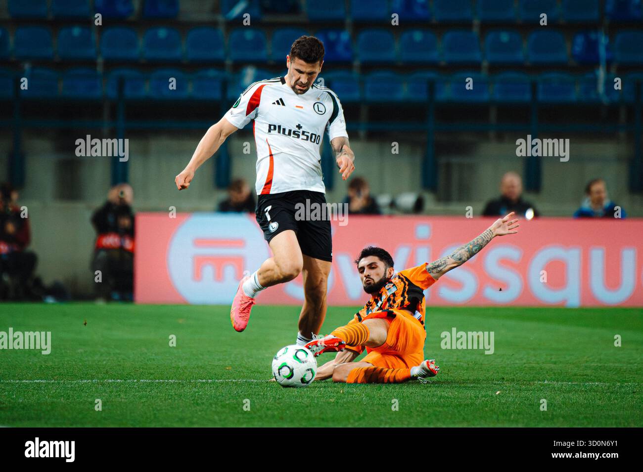 Krakow, Poland. 24th October, 2025. Pawel Wszolek (left,7) during the ...