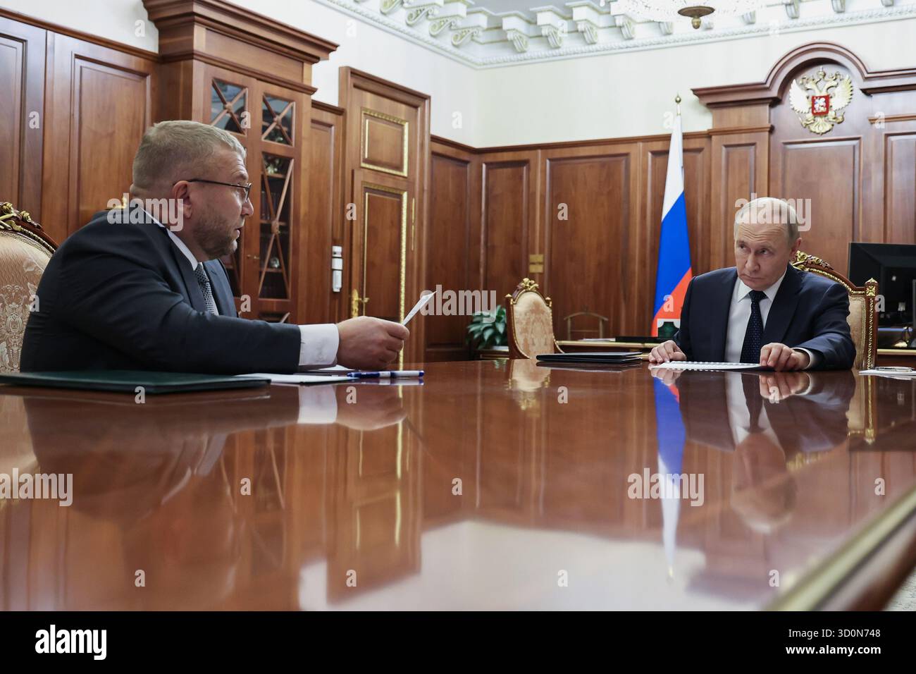 Russian President Vladimir Putin, right, listens to Federal Customs ...