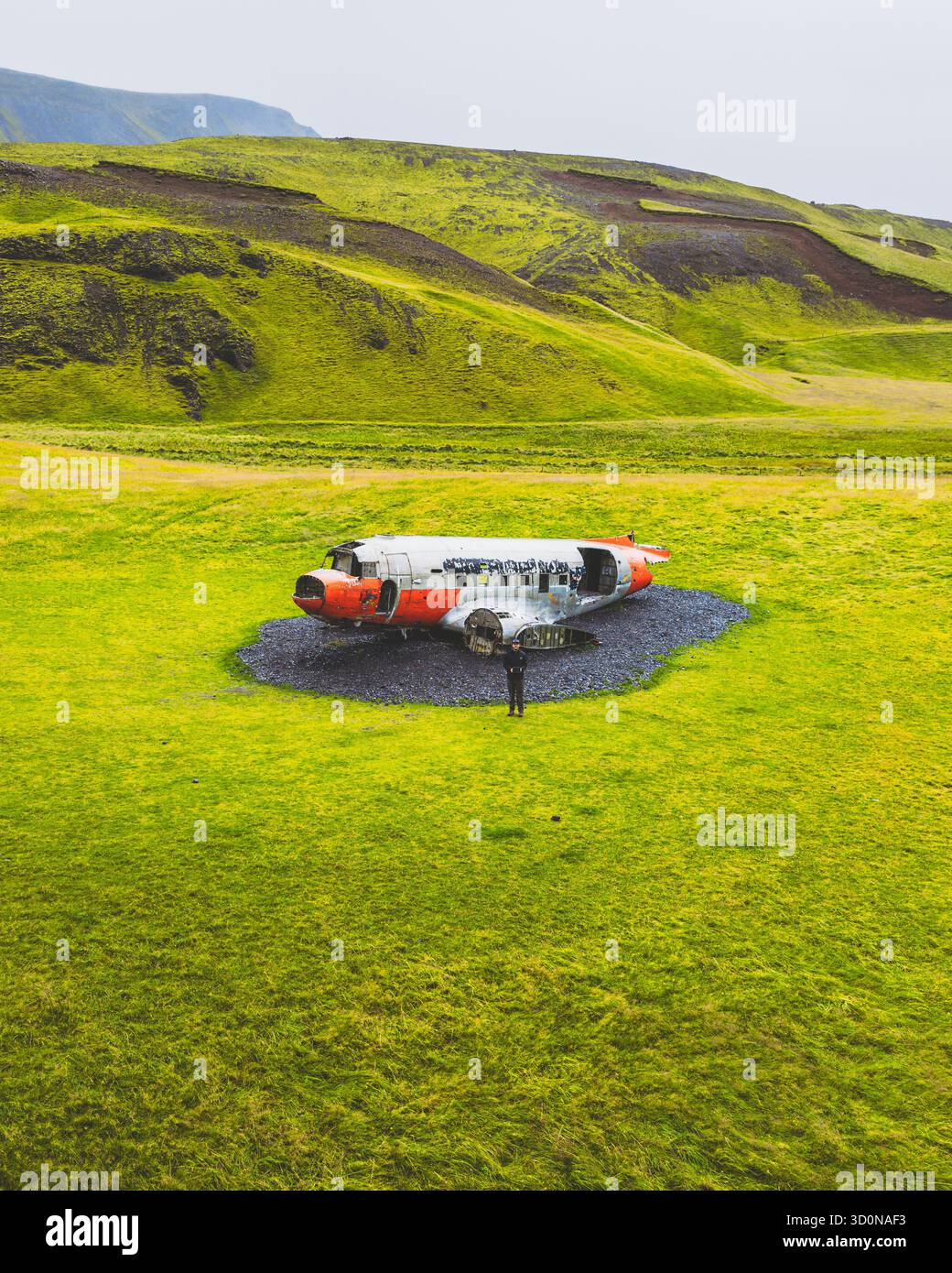 Aerial view of the stark white and orange DC-3 airplane wreck ...
