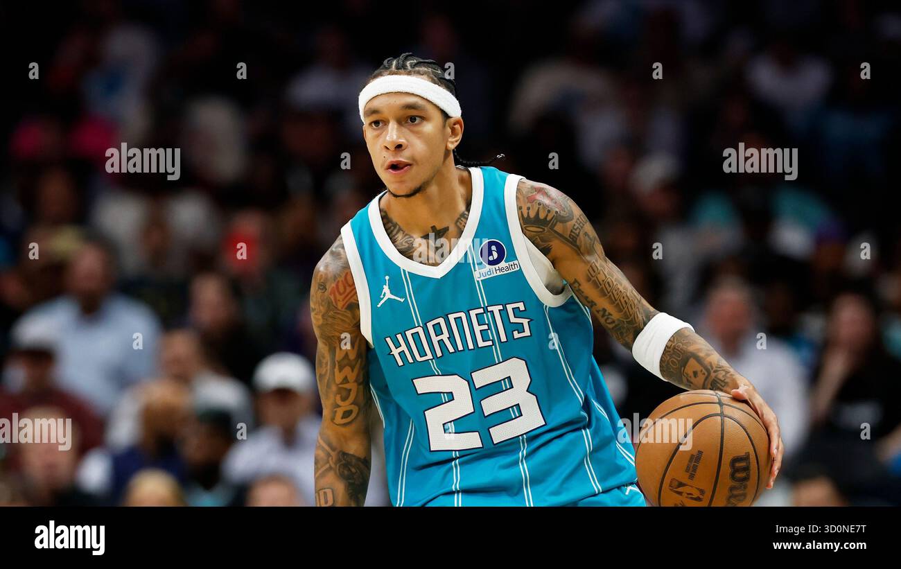 Charlotte Hornets guard Tre Mann brings the ball upcourt against the ...