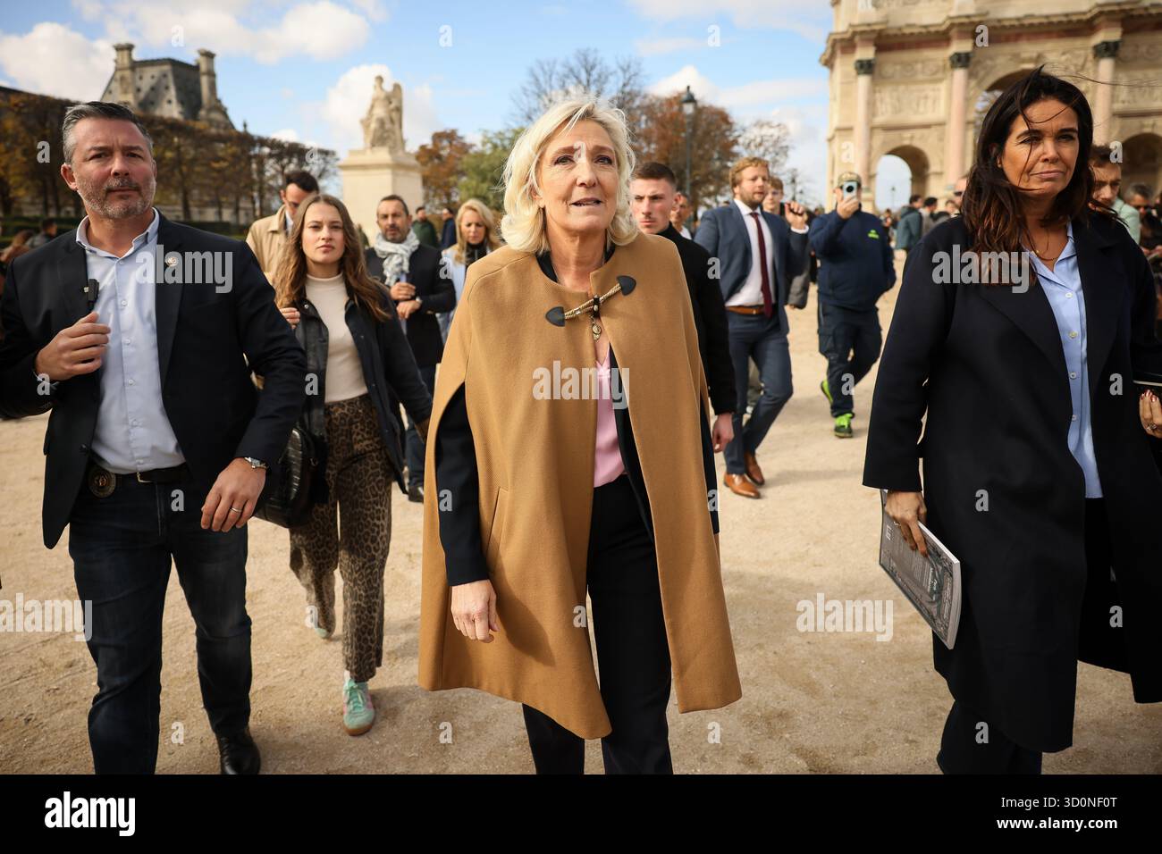 French far right leader Marine Le Pen, center, leaves after visiting an ...