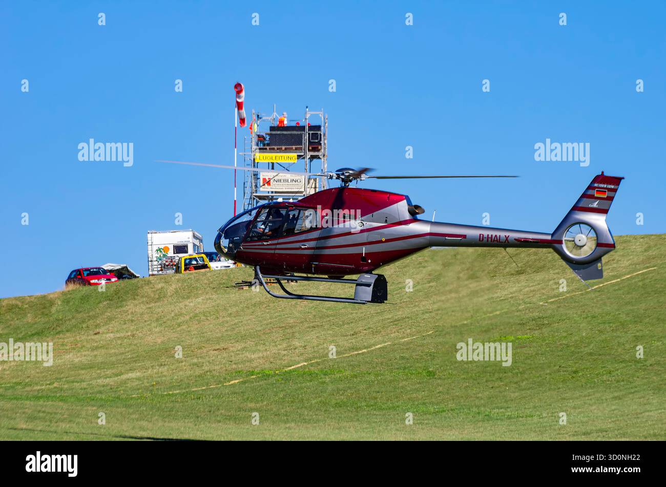 A Eurocopter EC 120B Colibri helicopter during a flight demonstration ...