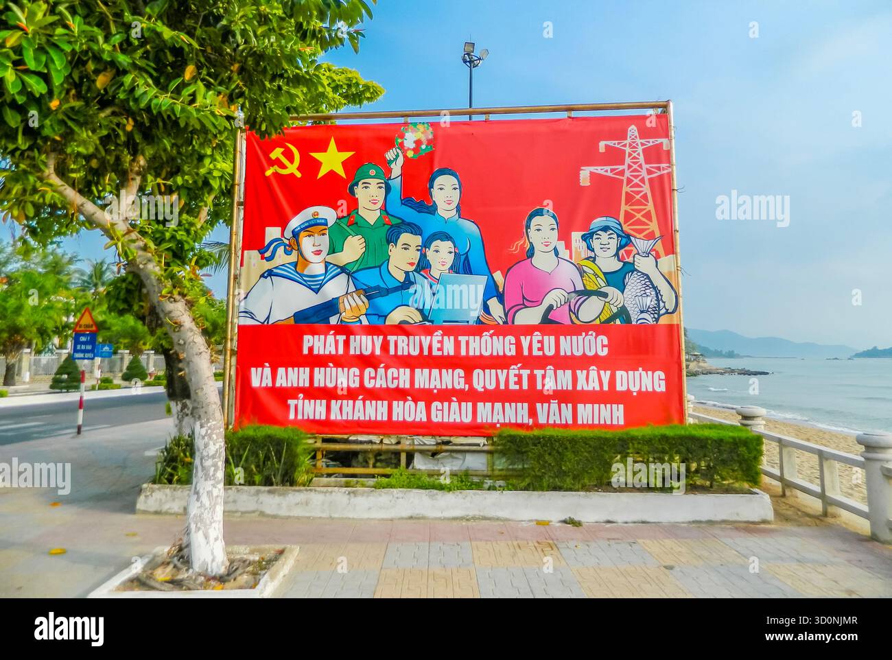 Communist propaganda red billboards united along a Vietnamese street ...