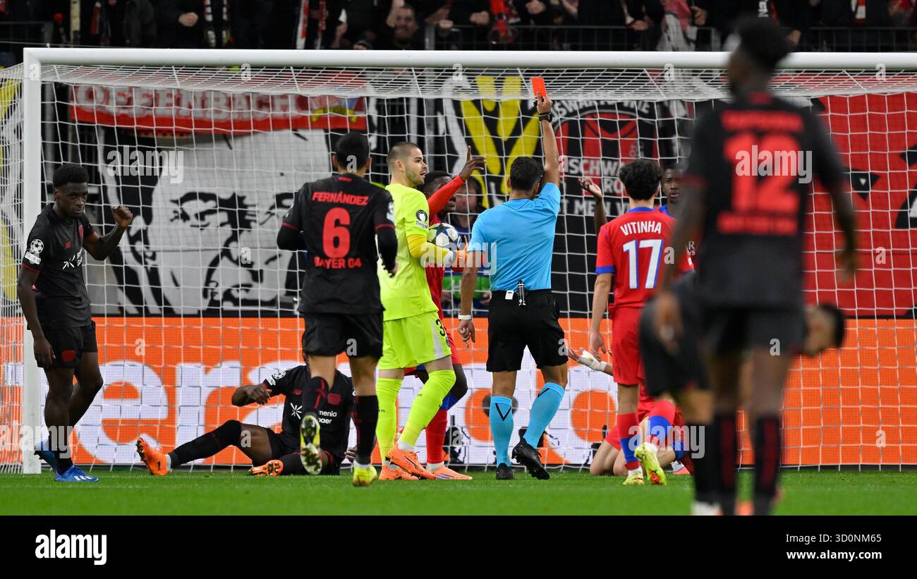 Referee Jesus Gil Manzano (Spain) shows Ilya Zabarnyi (PSG, obscured ...