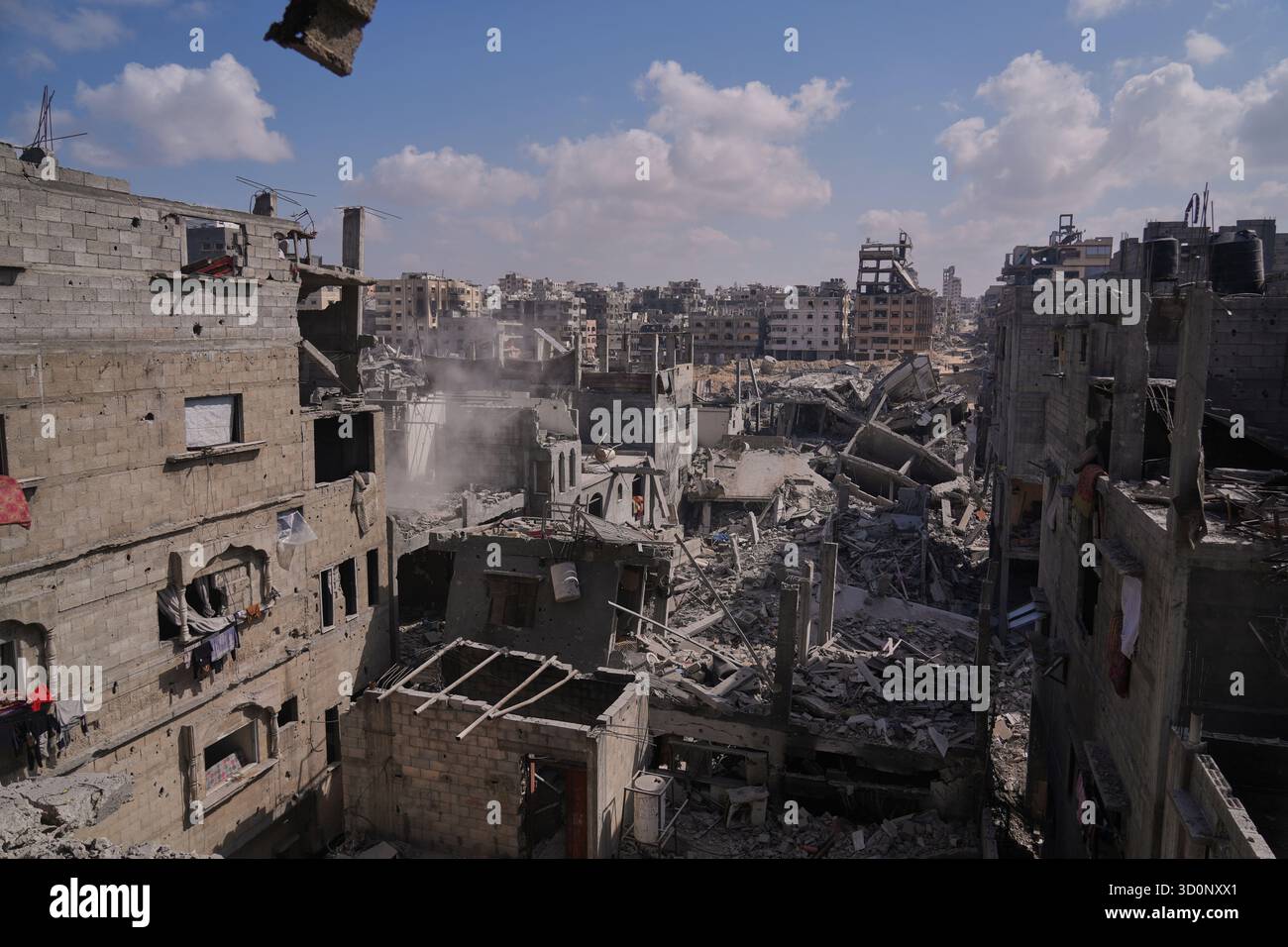 Buildings destroyed during the Israeli air and ground offensive are ...