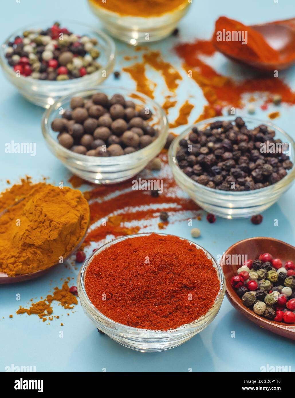 Aromatic spices and seasonings. Bright colors of Indian spices. Orange ...