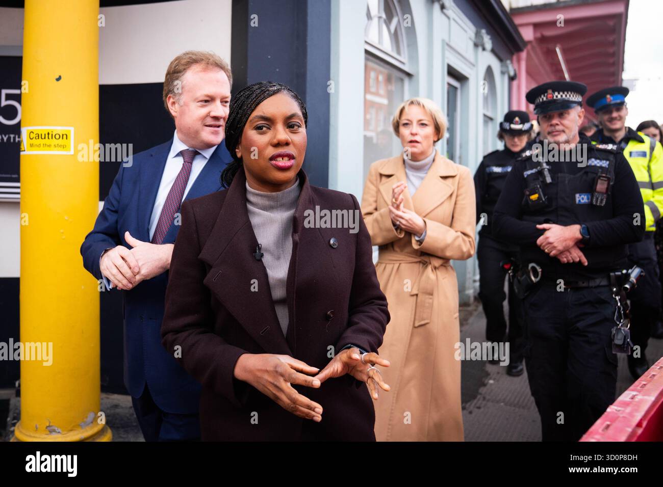 Conservative Party leader Kemi Badenoch walks with Gregory Stafford ...