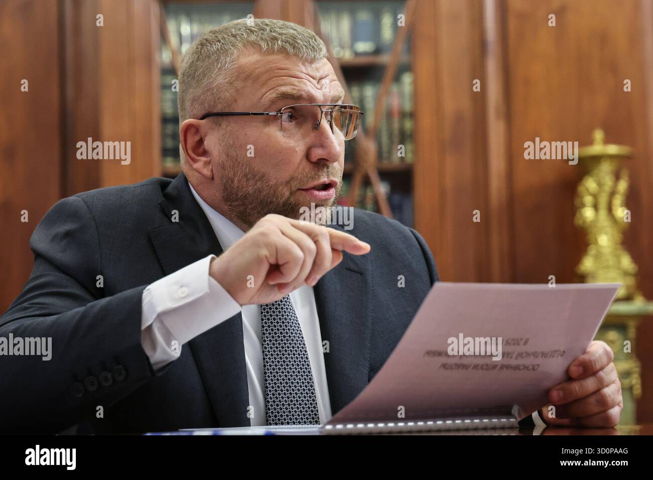 Federal Customs Service Head Valery Pikalev gestures while speaking to ...