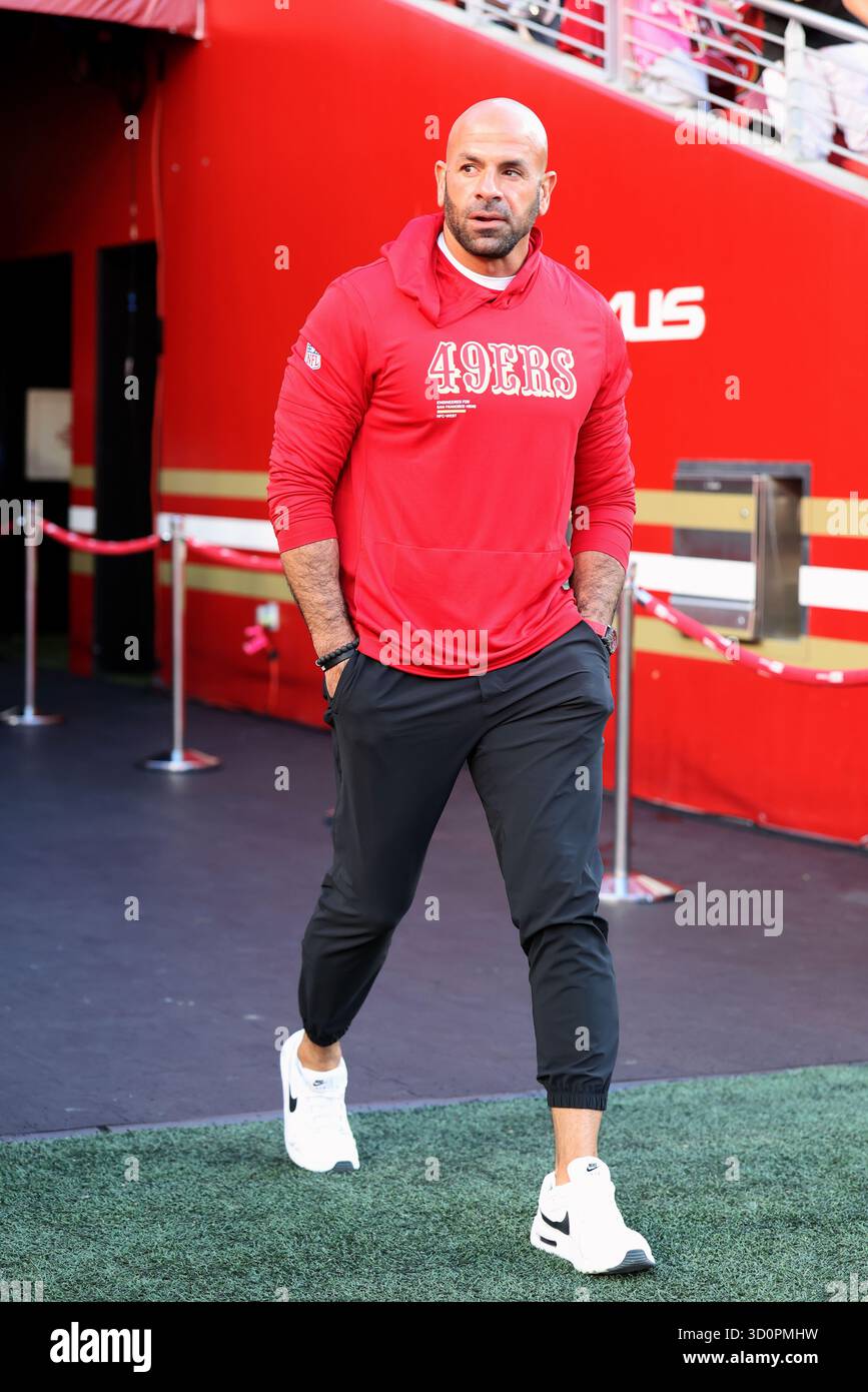 San Francisco 49ers defensive coordinator Robert Saleh walks on the ...