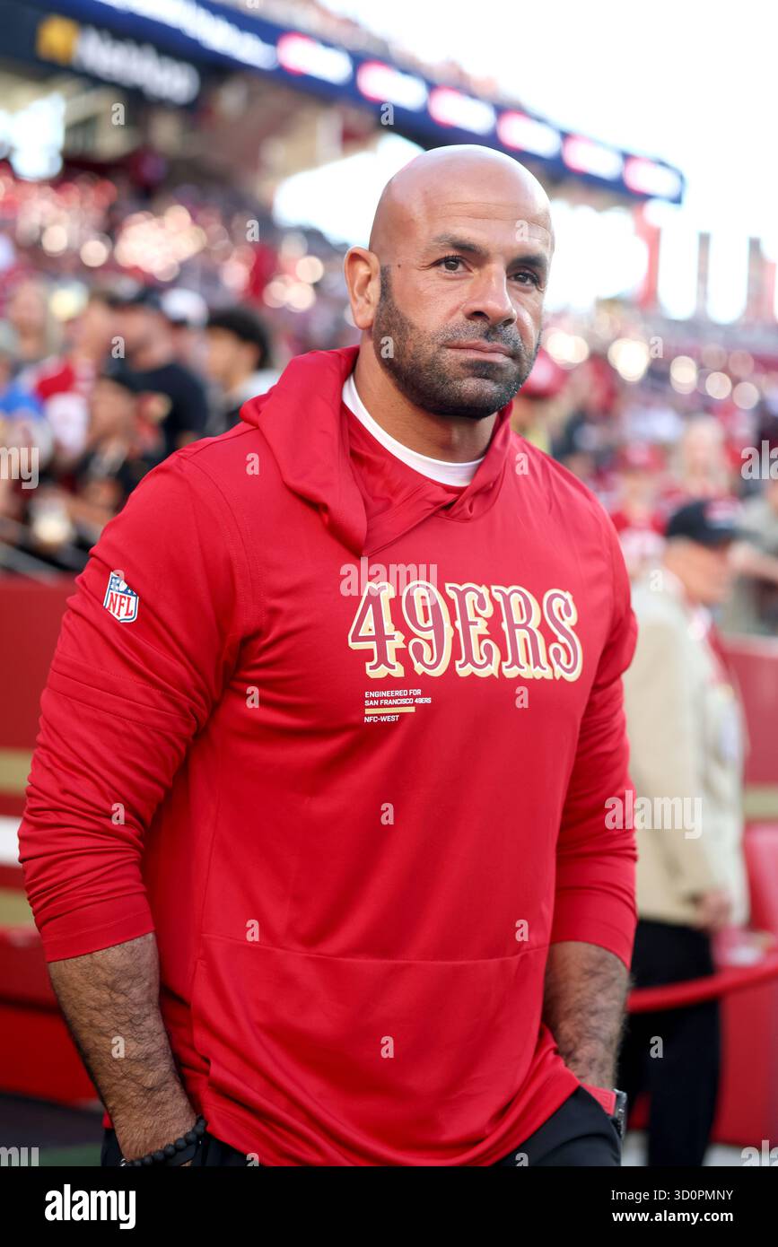 San Francisco 49ers defensive coordinator Robert Saleh walks on the ...