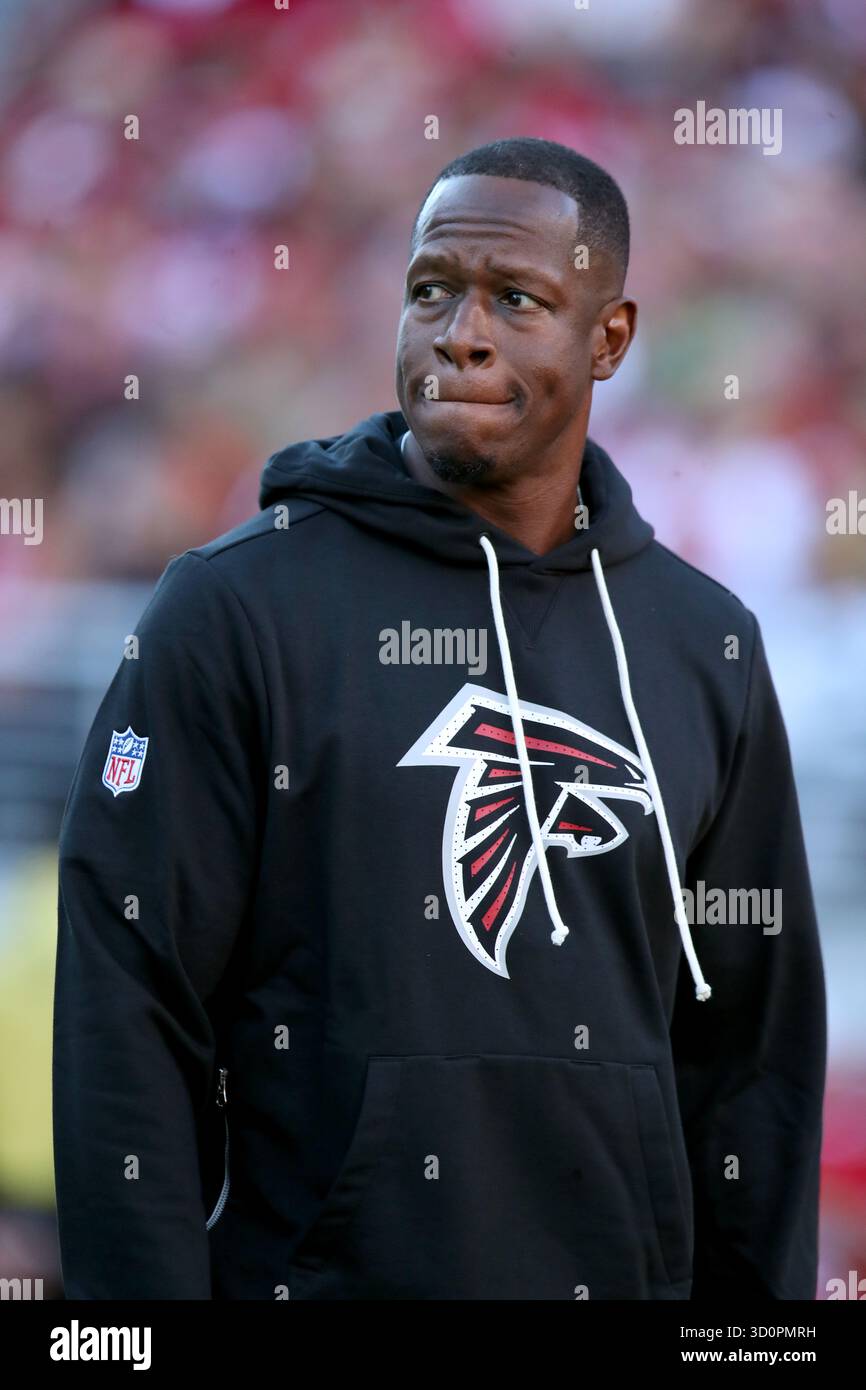Atlanta Falcons head coach Raheem Morris runs onto the field during an ...